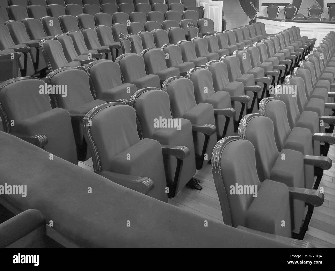 Black-and-white shot, monochrome, traditional, classic rows of empty ...