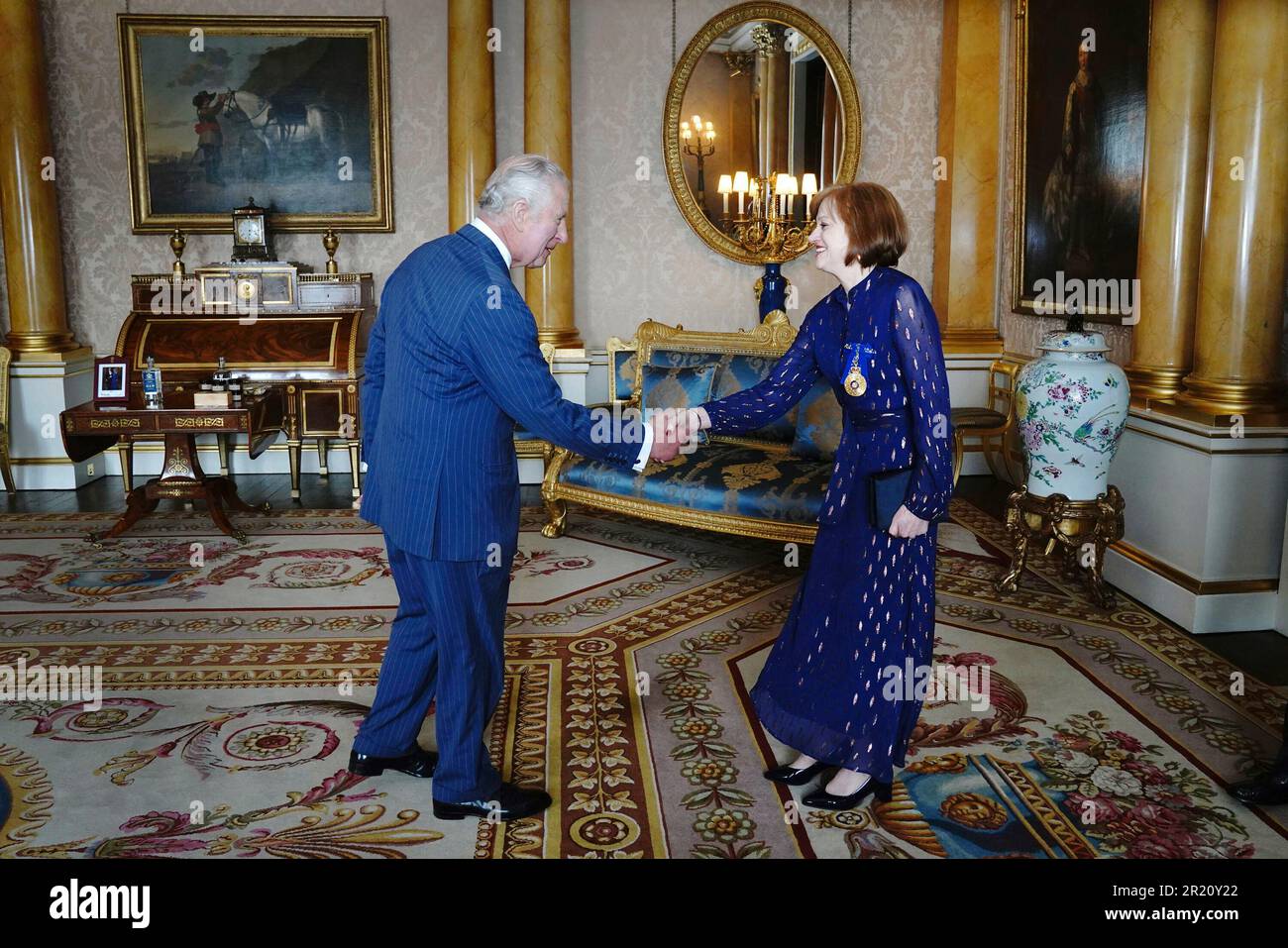 Britain's King Charles III, left, receives the Governor of Tasmania ...