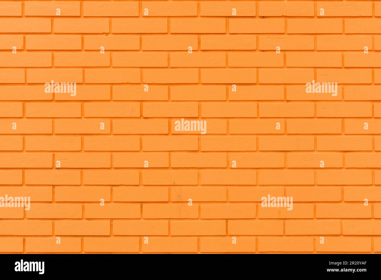 Vibrant orange brick wall pattern as graphic design element and ...