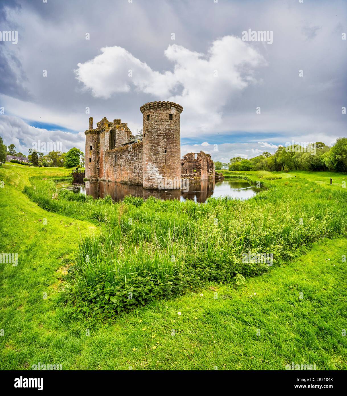 These the ruins of the 13th century Scottish fortress of Caerlaverock Castle on the Scottish ...
