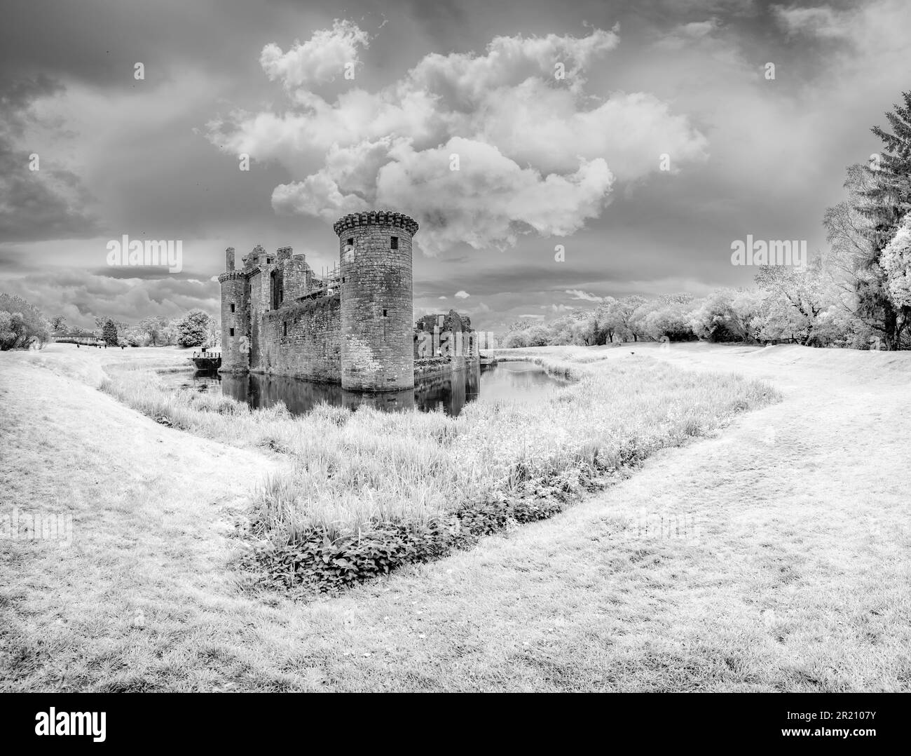 These the ruins of the 13th century Scottish fortress of Caerlaverock Castle on the Scottish ...