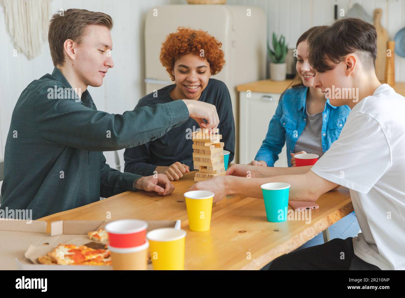Women having fun with board game hi-res stock photography and images ...