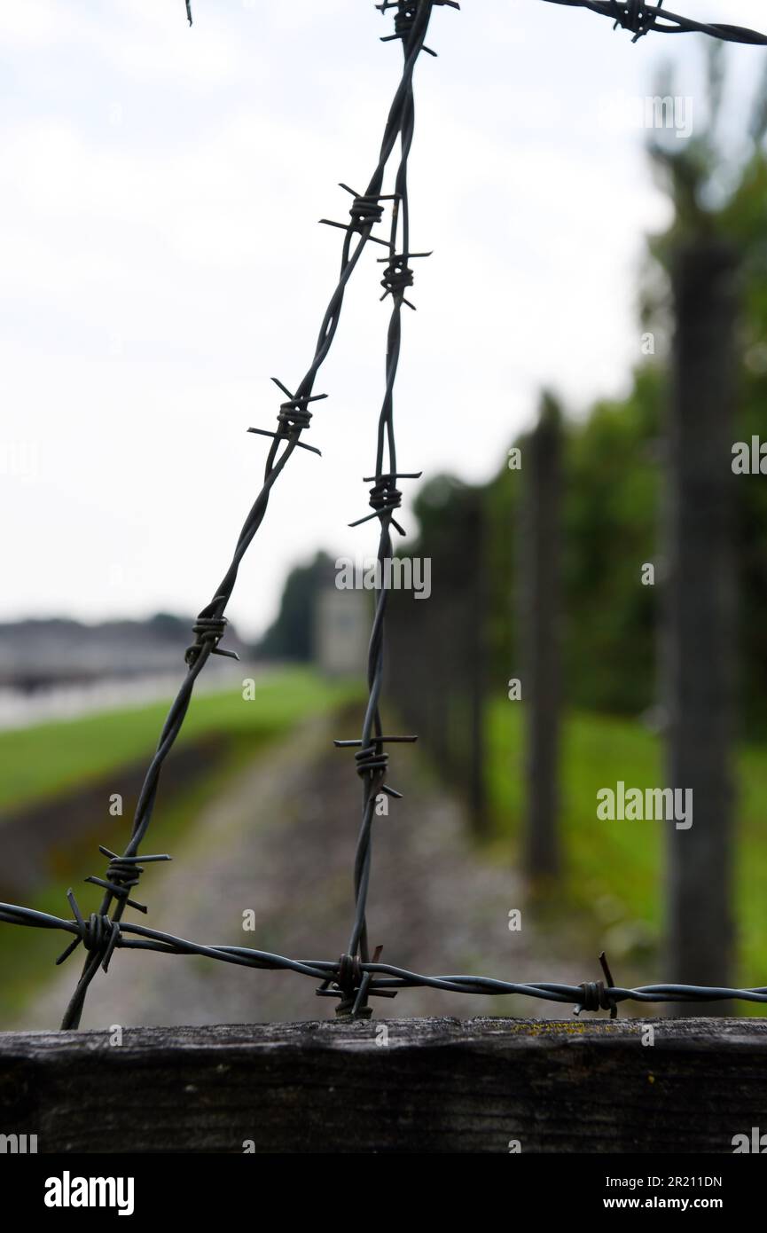 Photograph of the barbed wire that surrounds the perimeter fence at ...