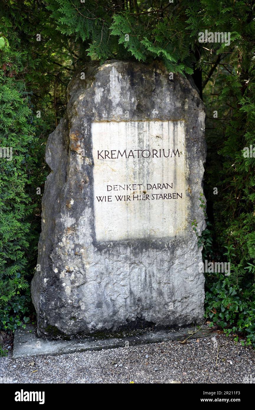 Photograph of a memorial plaque at Dachau concentration camp. The ...