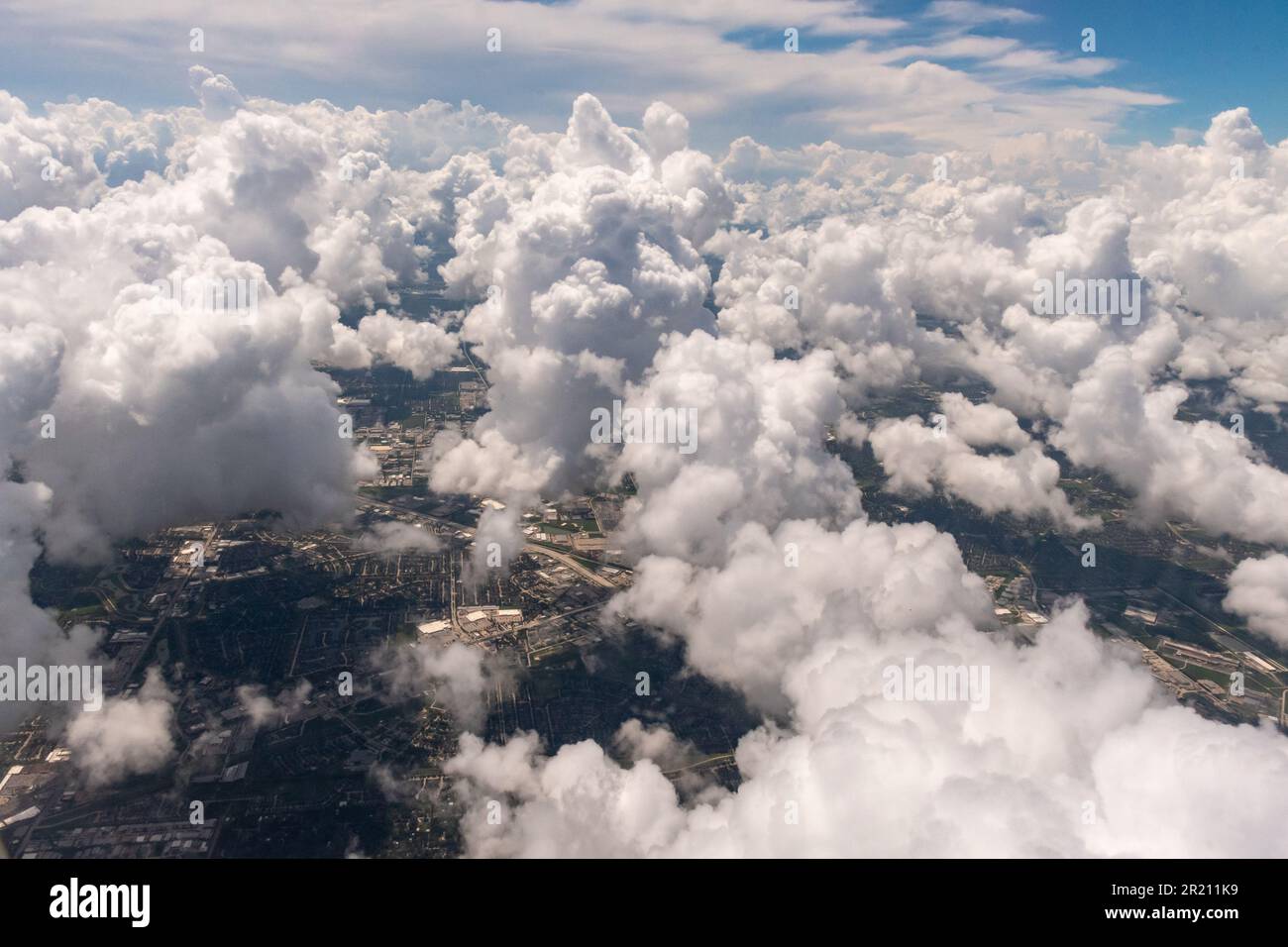 Aerial view of Clouds outside of an airplane window on a trip from ...