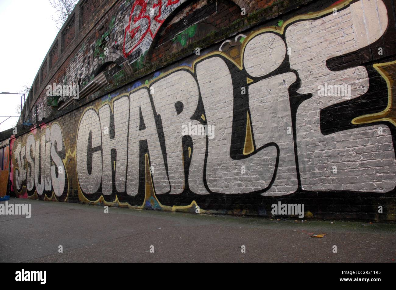 Photograph of graffiti on a wall in Hackney in support of the attacks ...
