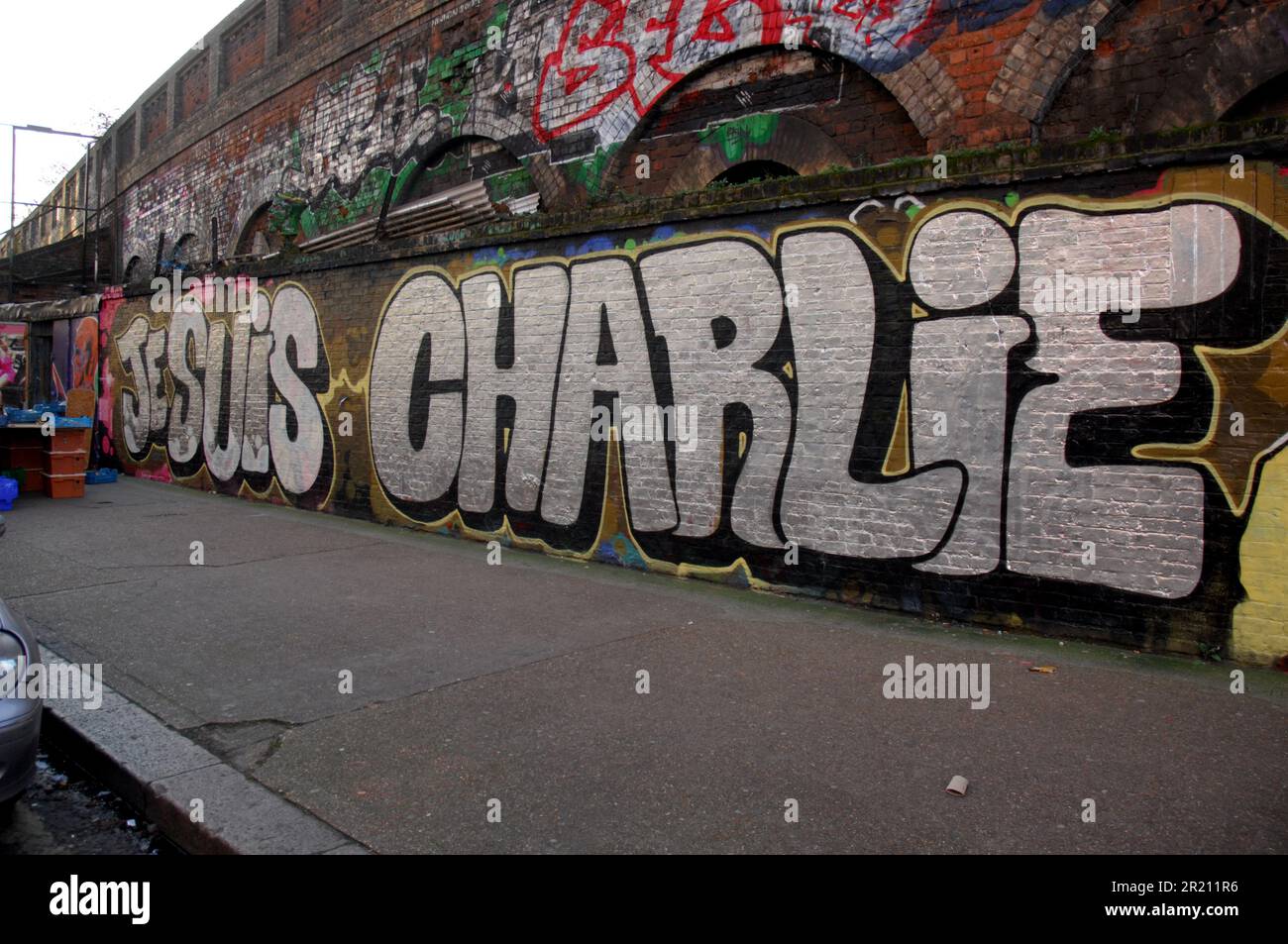 Photograph of graffiti on a wall in Hackney in support of the attacks ...