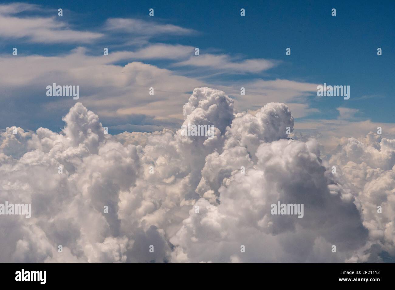 Aerial view of Clouds outside of an airplane window on a trip from ...