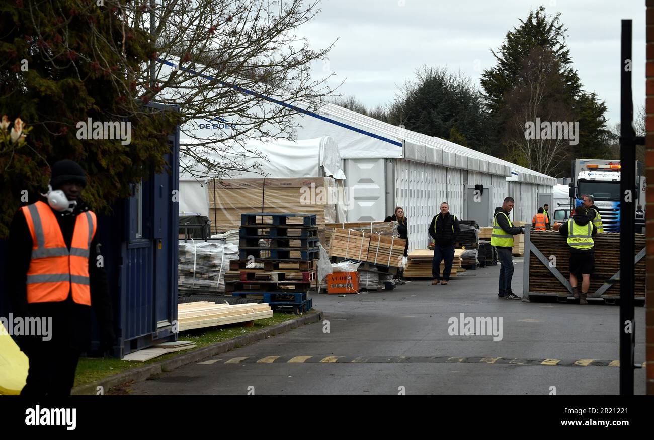Photograph of a temporary mortuary being constructed in the main car ...