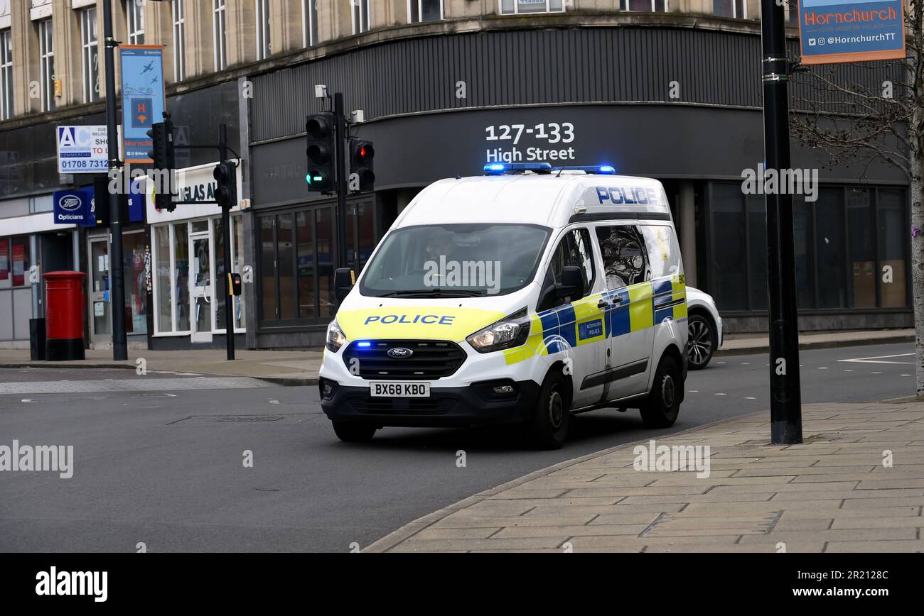Photograph of a police patrol van on an emergency call during the COVID ...