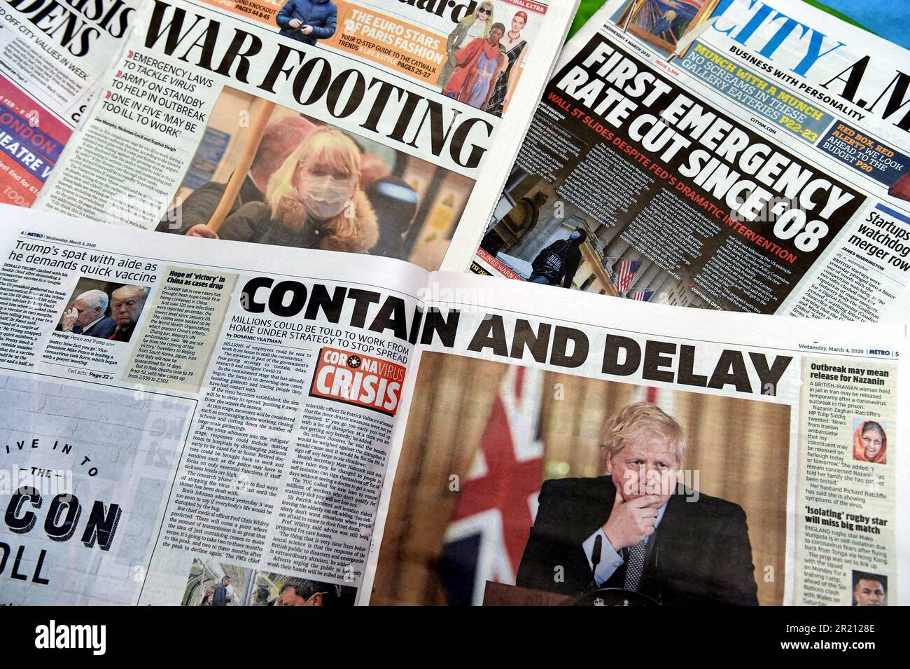 Photograph of a collection of headlines from UK newspapers reporting on ...