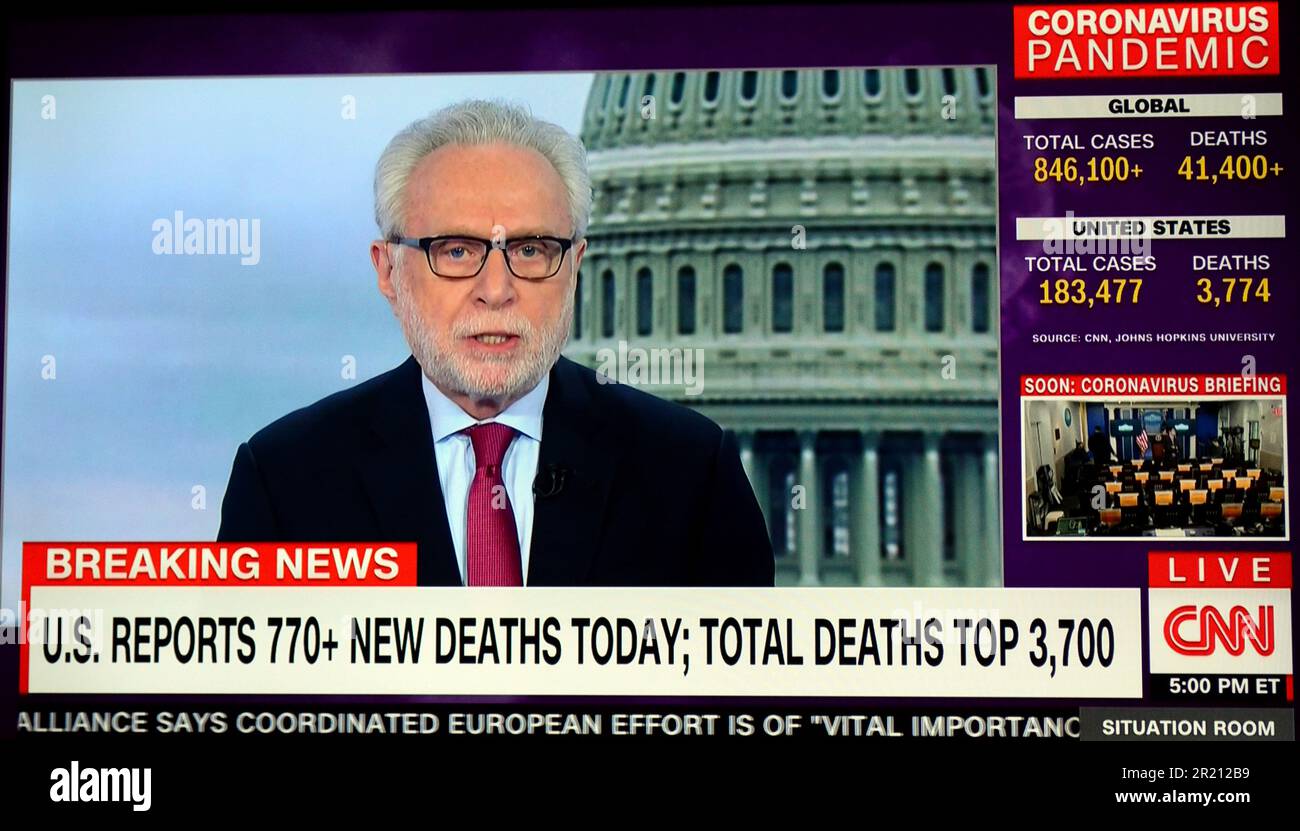 A screengrab from CNN depicting anchor Wolf Blitzer as the COVID-19 ...