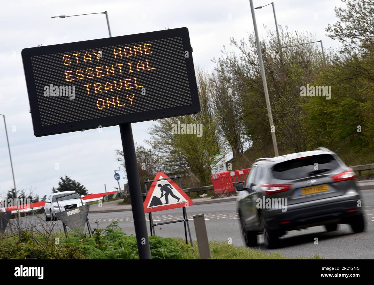 Photograph of a matrix sign urging people to stay home during the COVID ...