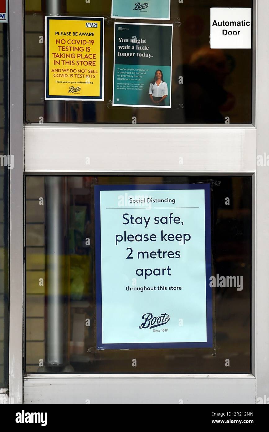 Photograph of a sign placed in Boots stores asking customers to abide ...
