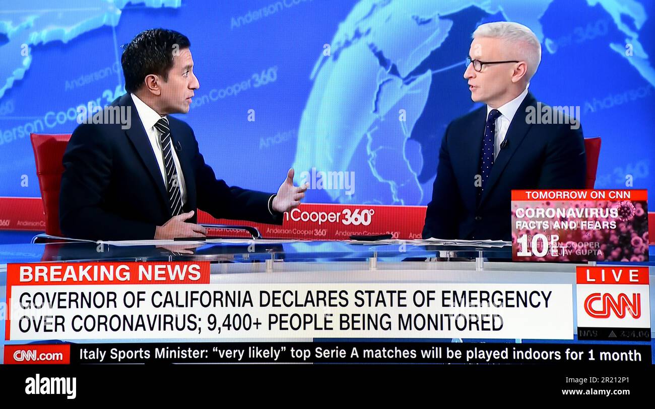 Screengrab from CNN depicting Dr Sanjay Gupta talking to the anchor ...