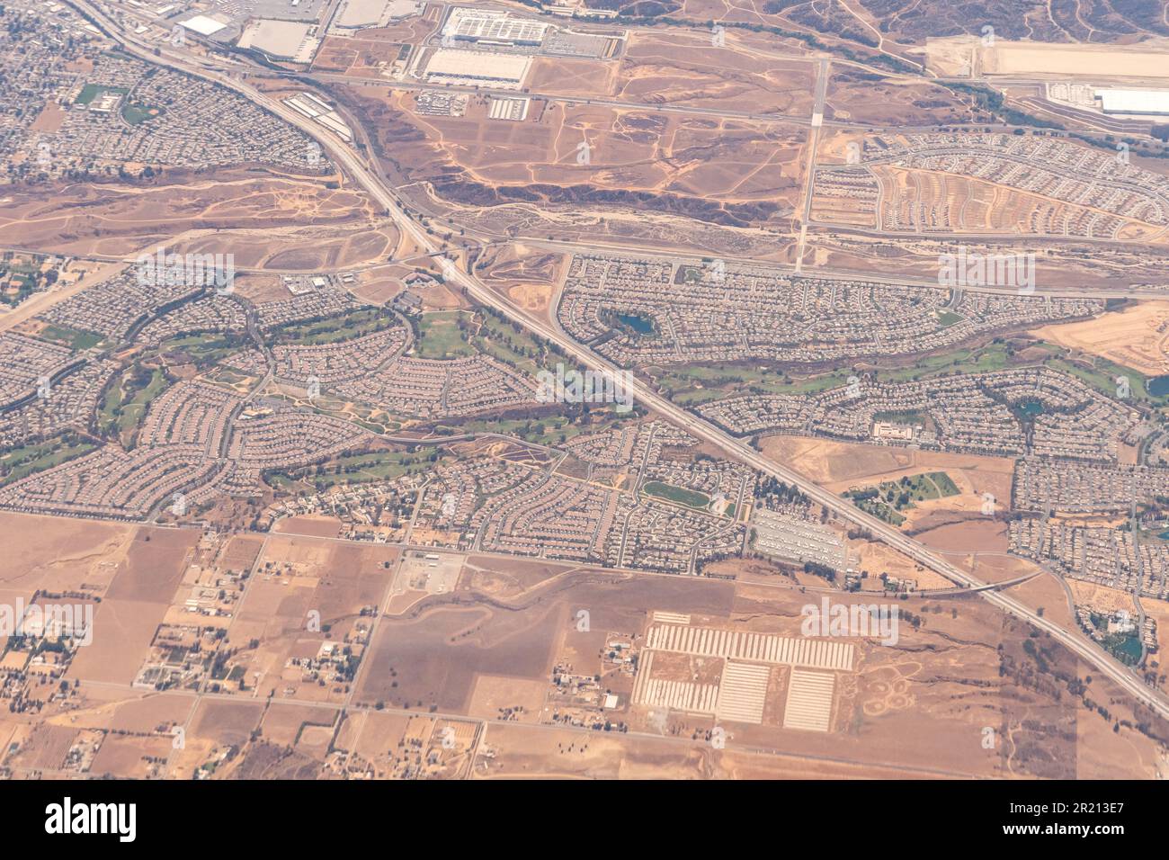 Aerial view of gated planned communities, construction, highways and ...