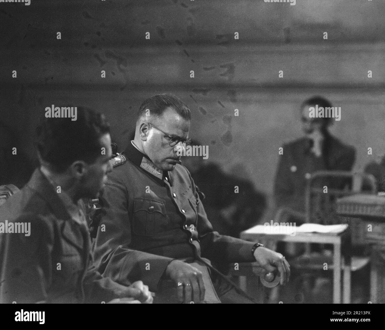 German General Anton Dostler wore this downcast expression at his trial ...