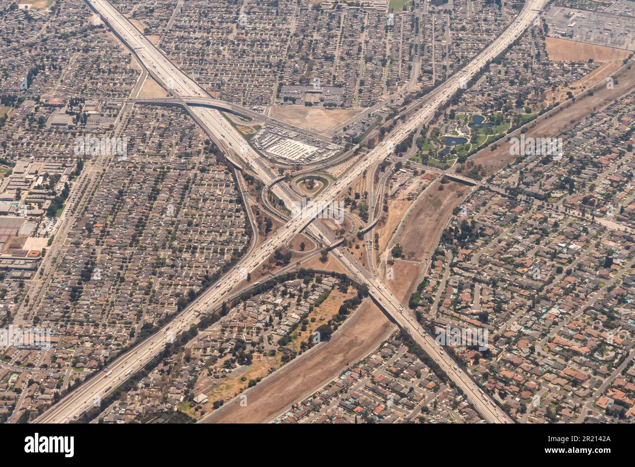 Aerial View the interchange of the I-5 Santa Ana Freeway & the I-605 San Gabriel Freeway w/ San ...