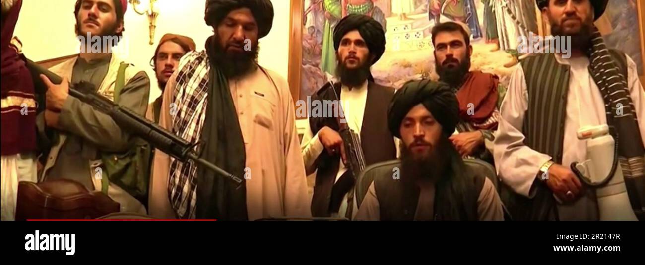 A screengrab from CNN shows the Taleban at the presidential palace ...