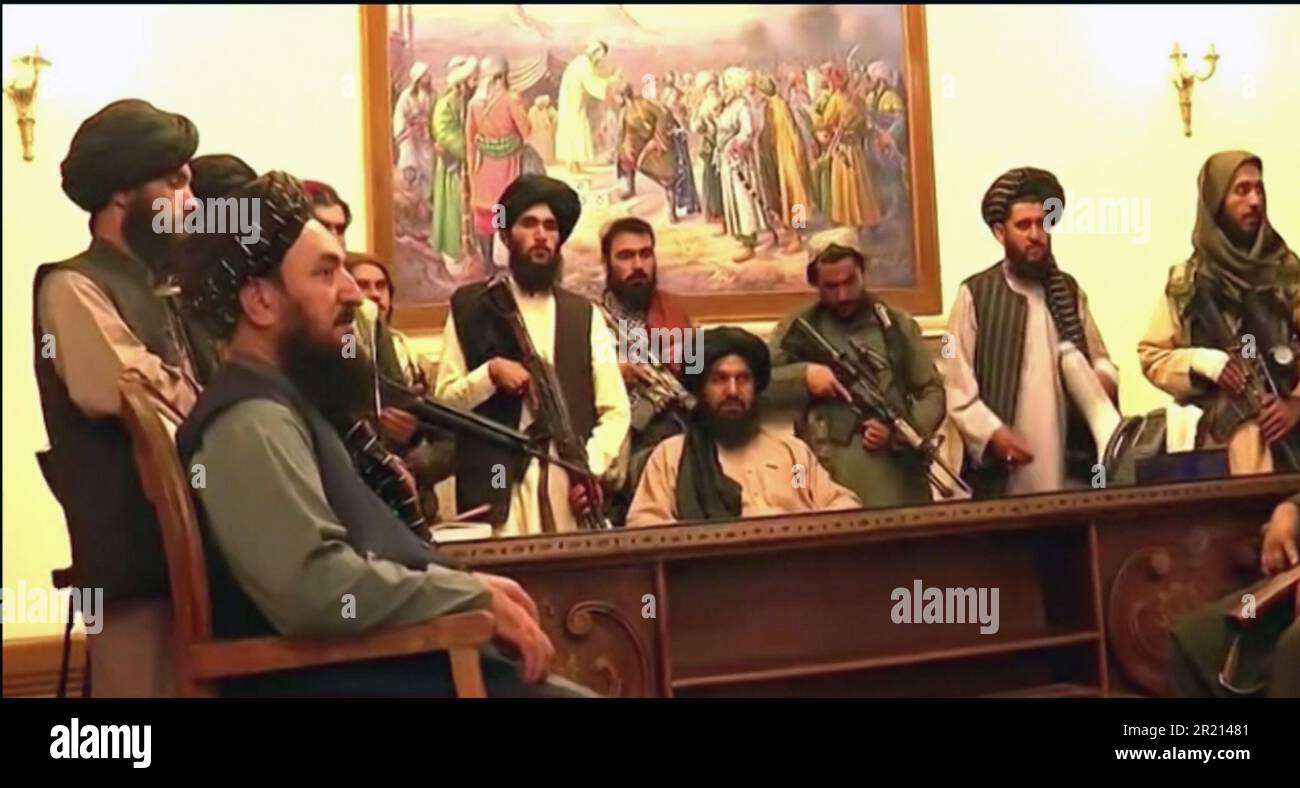 A screengrab from CNN shows the Taleban at the presidential palace ...