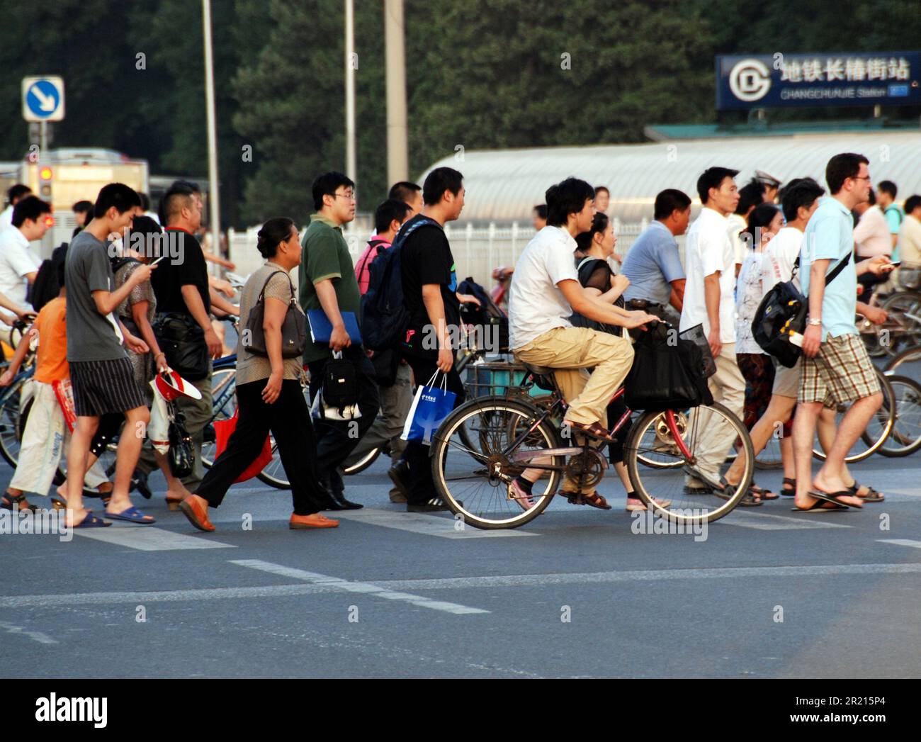 Busy street scene at a road crossing, Beijing, China Stock Photo - Alamy