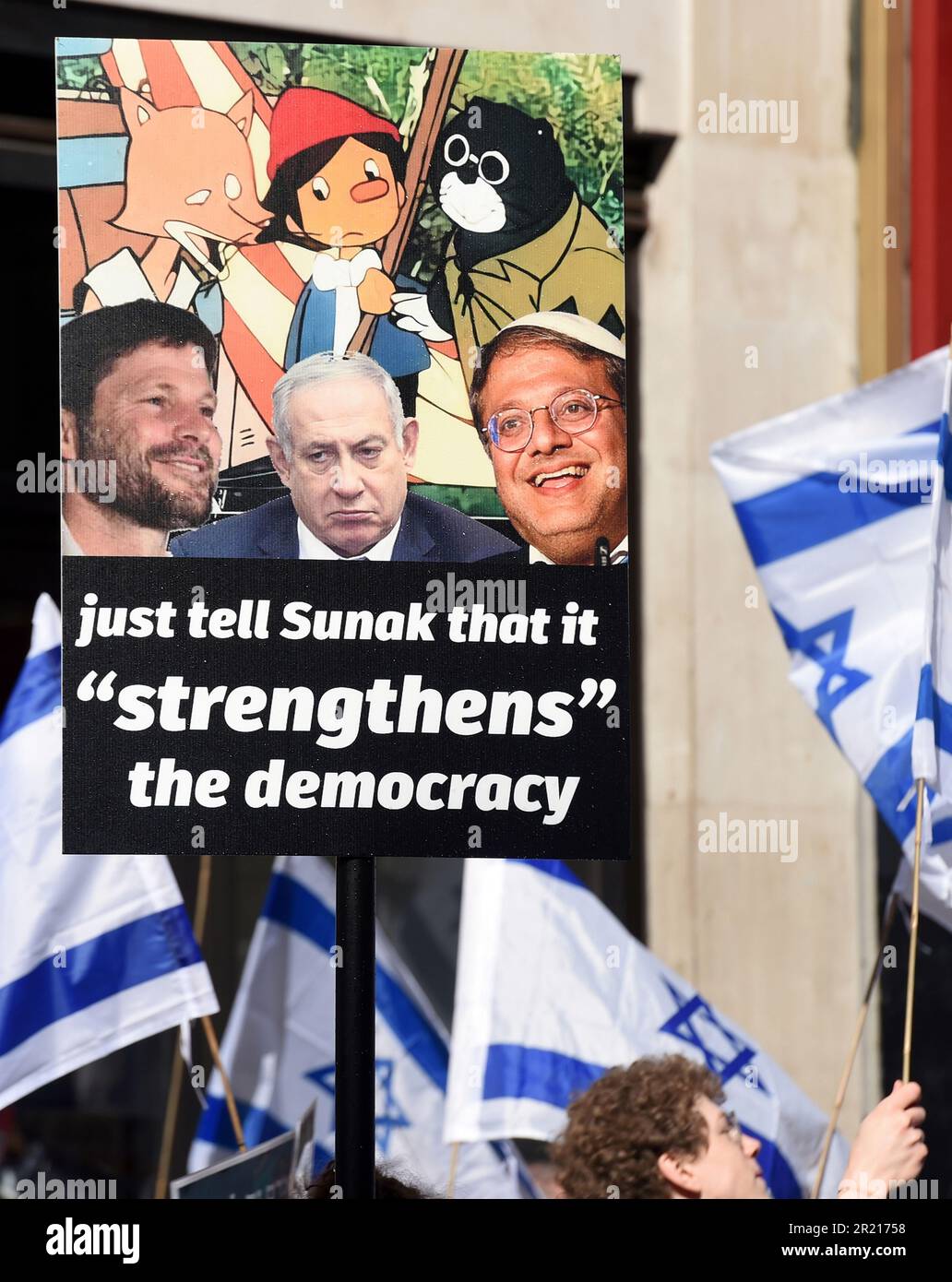 A placard depicting Bezalel Smotrich , Benjamin Netanyahu, and Itamar ...