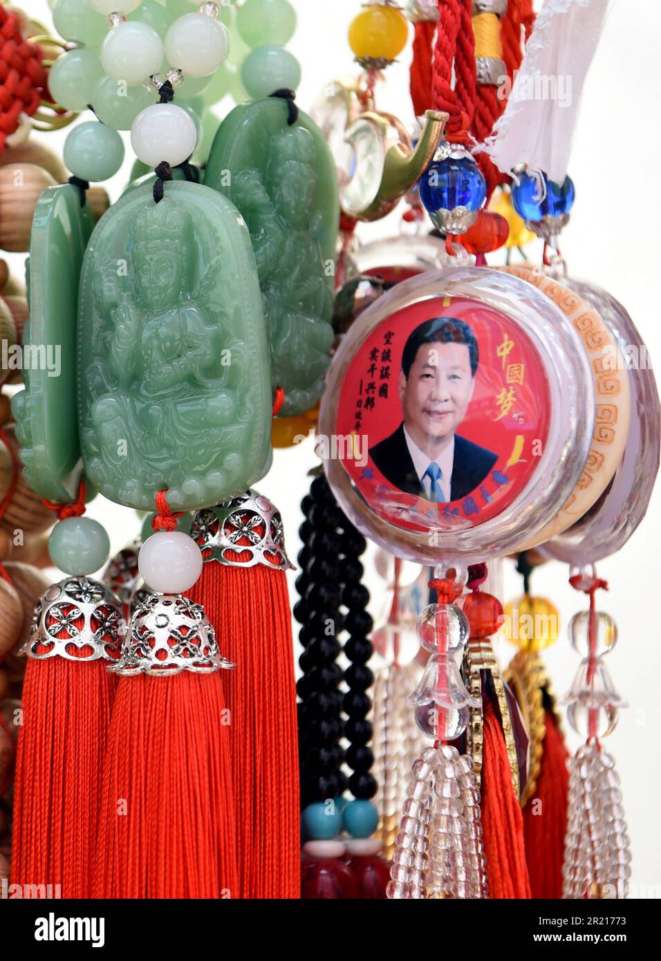Bronze busts of Mao Zedong, Joseph Stalin and Adolph Hitler on a stall ...