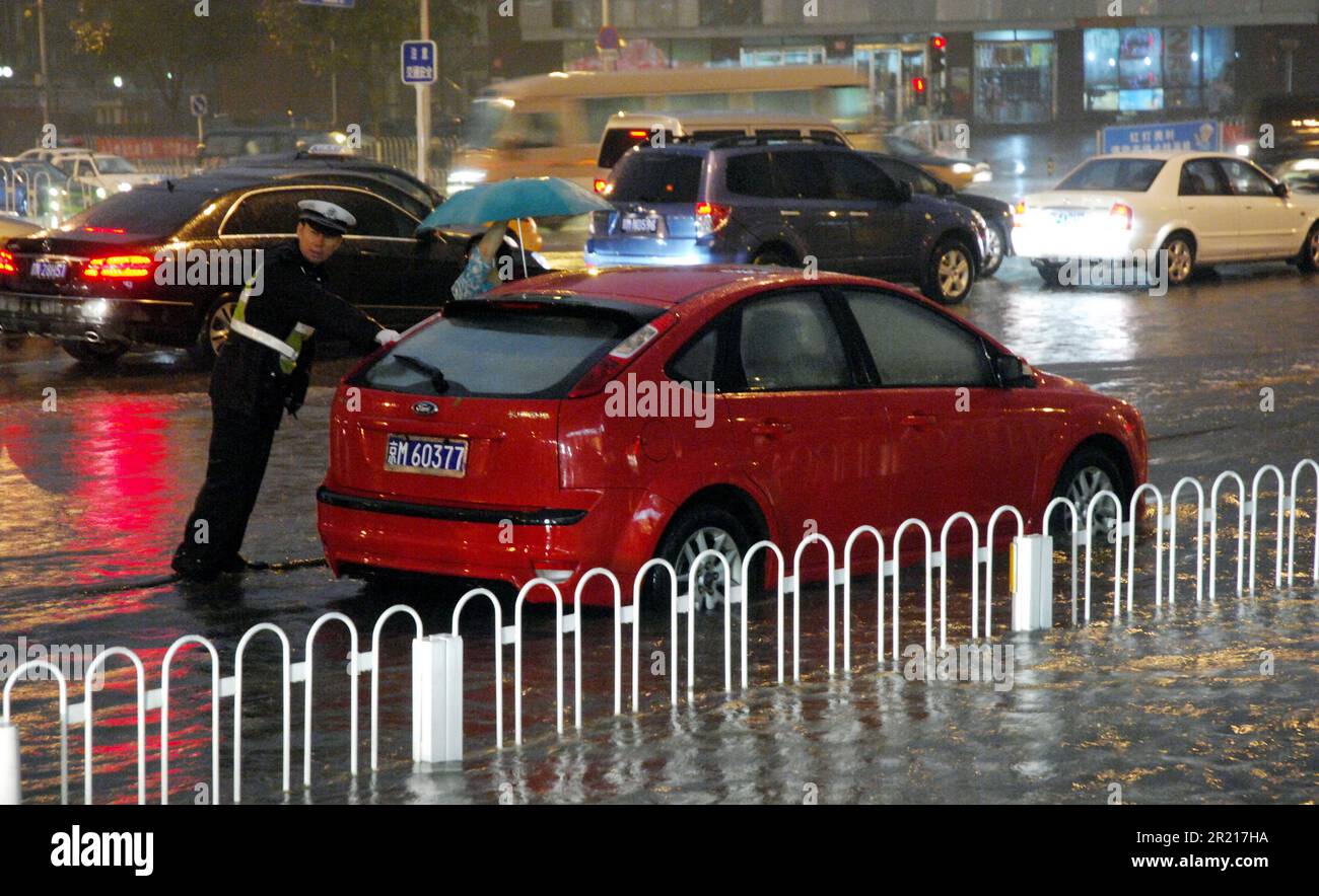 Thursday 23/06/2011. Heavy rain hits Beijing, China, causing localised ...