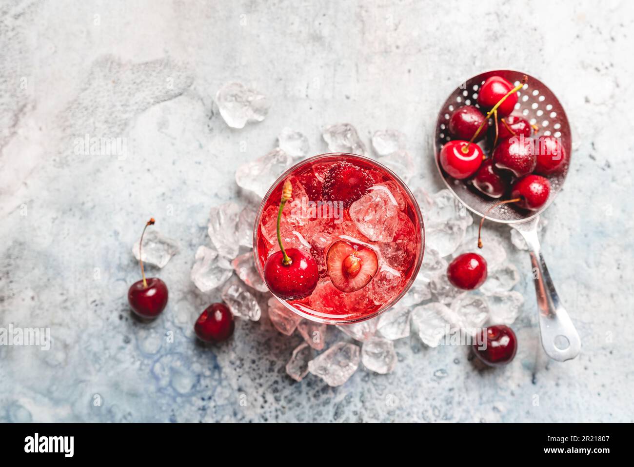 Cold sweet cherries lemonade Stock Photo - Alamy