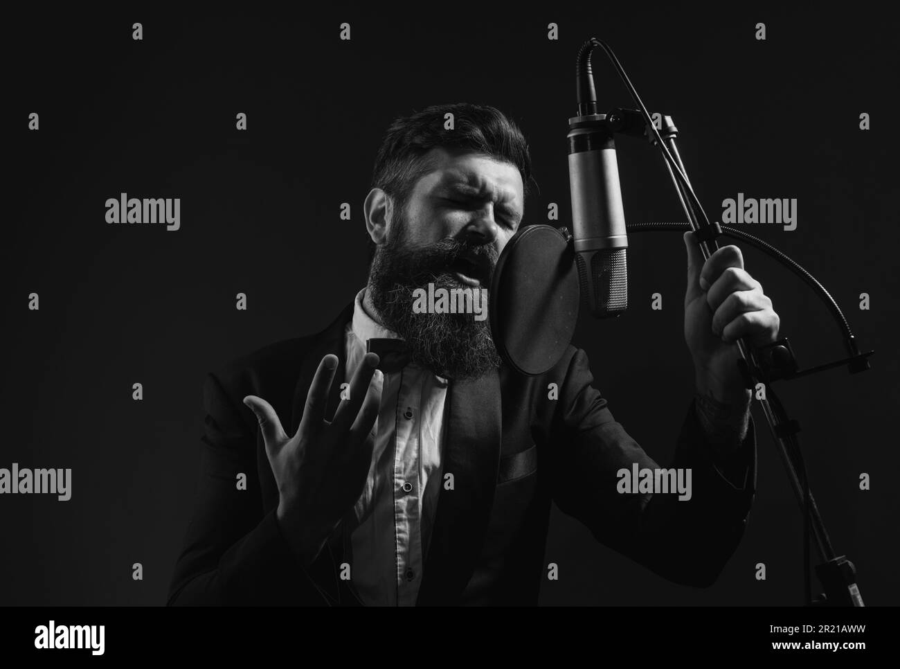 Man headphones music recording Black and White Stock Photos & Images ...