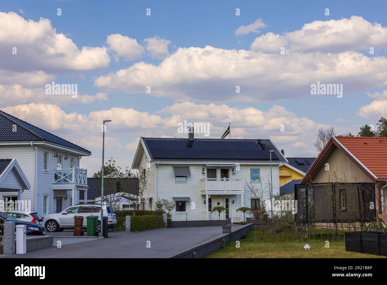 Beautiful view of modern European suburb with villa roof equipped with ...