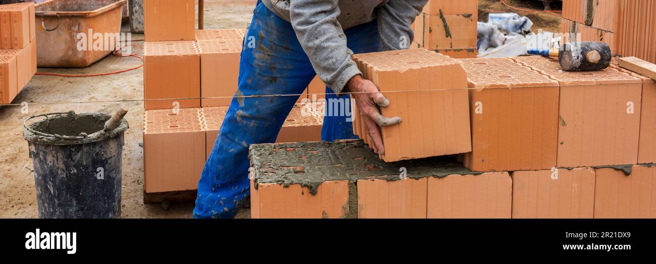 bricklayer working at new built home Stock Photo - Alamy