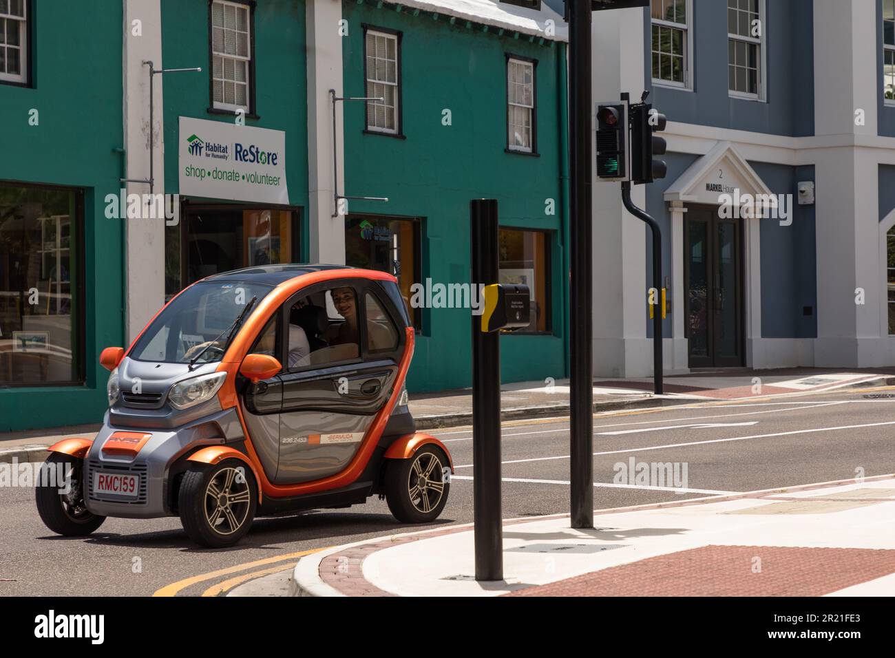 A Twizy microcar plies a downtown street in the Bermuda capital of ...