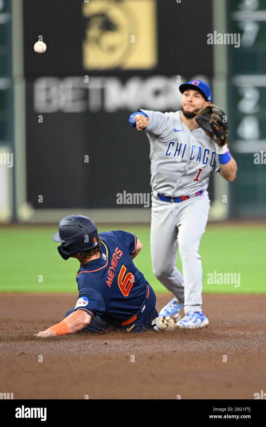 Chicago Cubs third baseman Nick Madrigal (1) turns a double play with ...