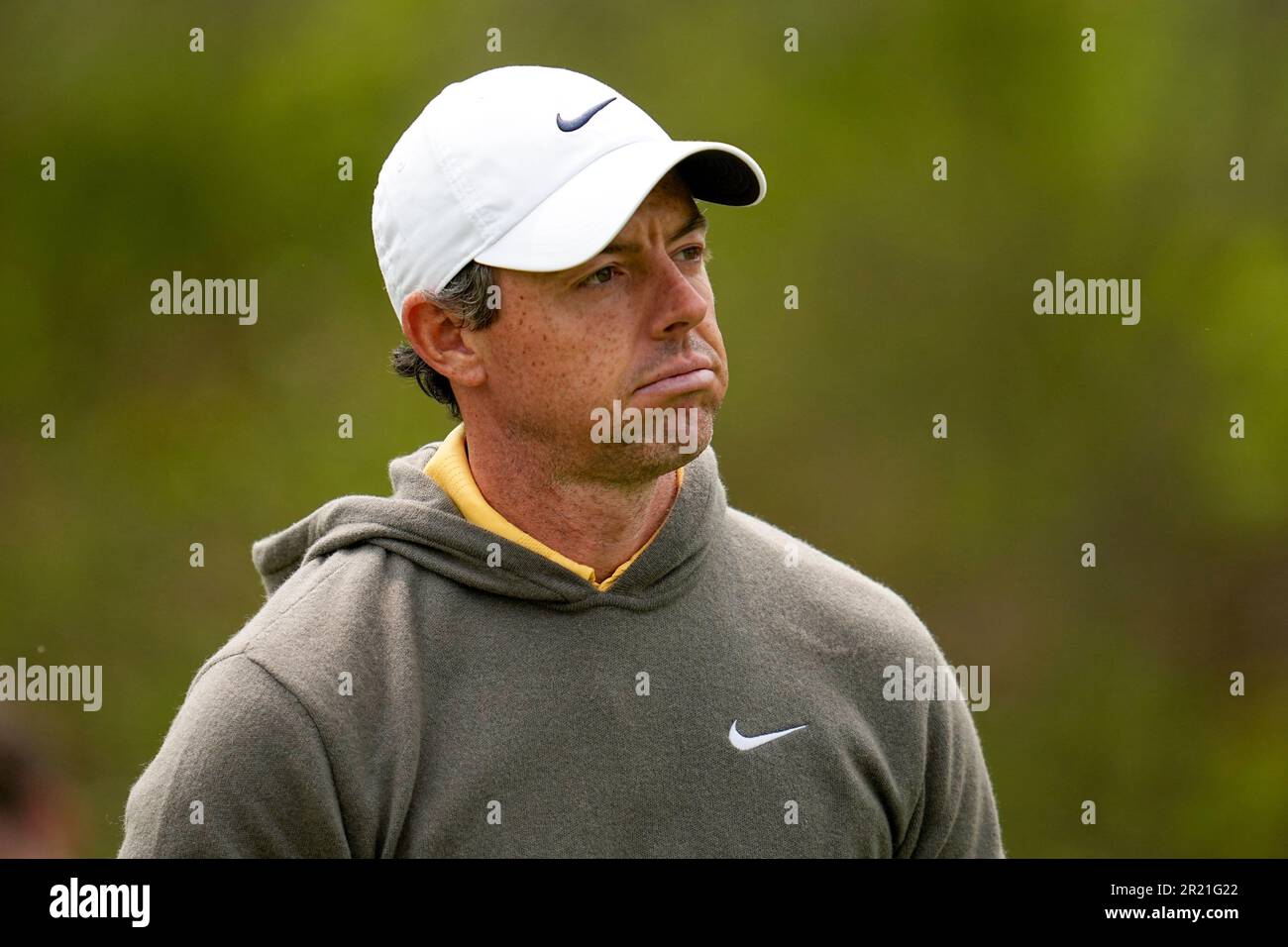 Rory McIlroy, of Northern Ireland, watches his tee shot on the fourth ...