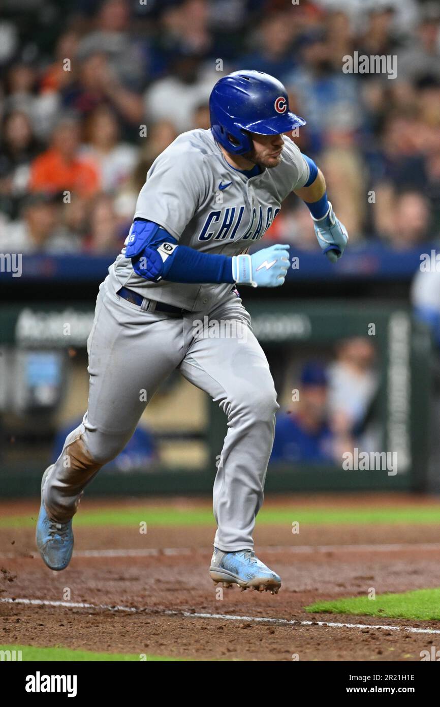 Chicago Cubs left fielder Ian Happ (8) reaches on an infield single in ...