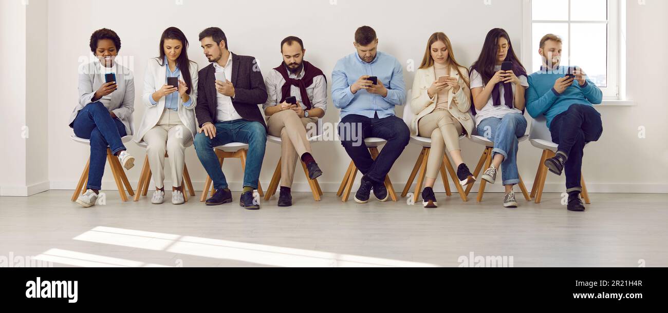 Group of people sitting in office with wifi connection and messaging on ...