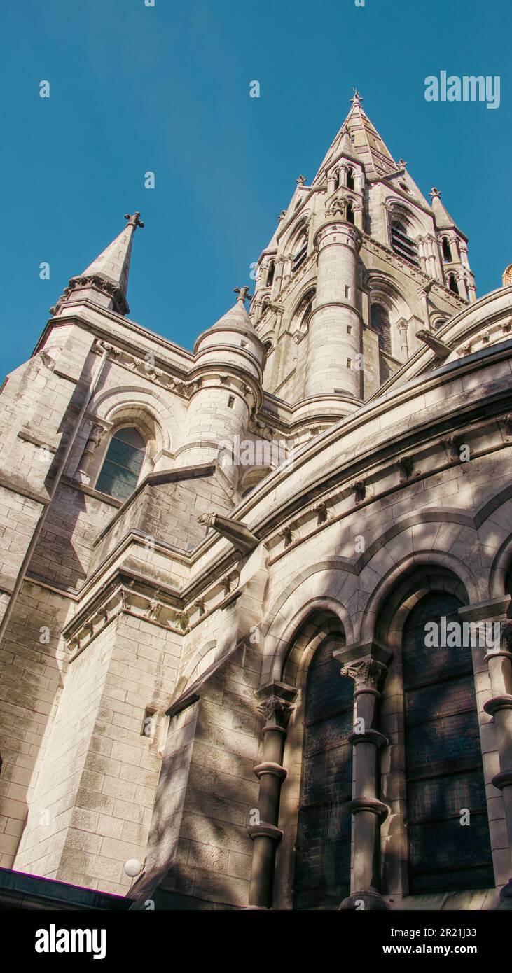 The Gothic spire of an Anglican church in Cork, Ireland. Neo-Gothic ...