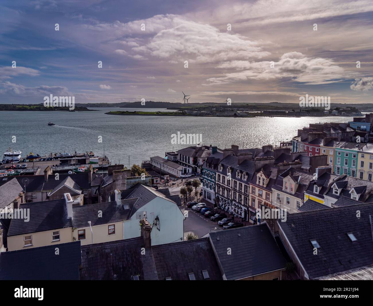 View of the small coastal Irish town of Cobh, urban landscape. Evening ...
