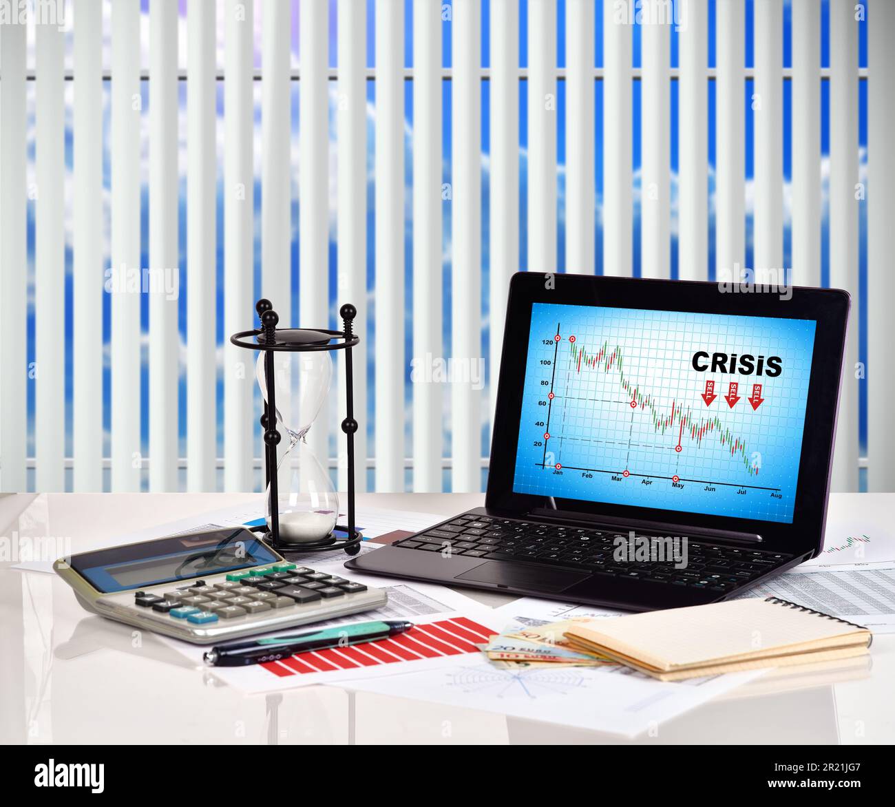 Crisis chart on screen notebook. Financial and business charts and ...