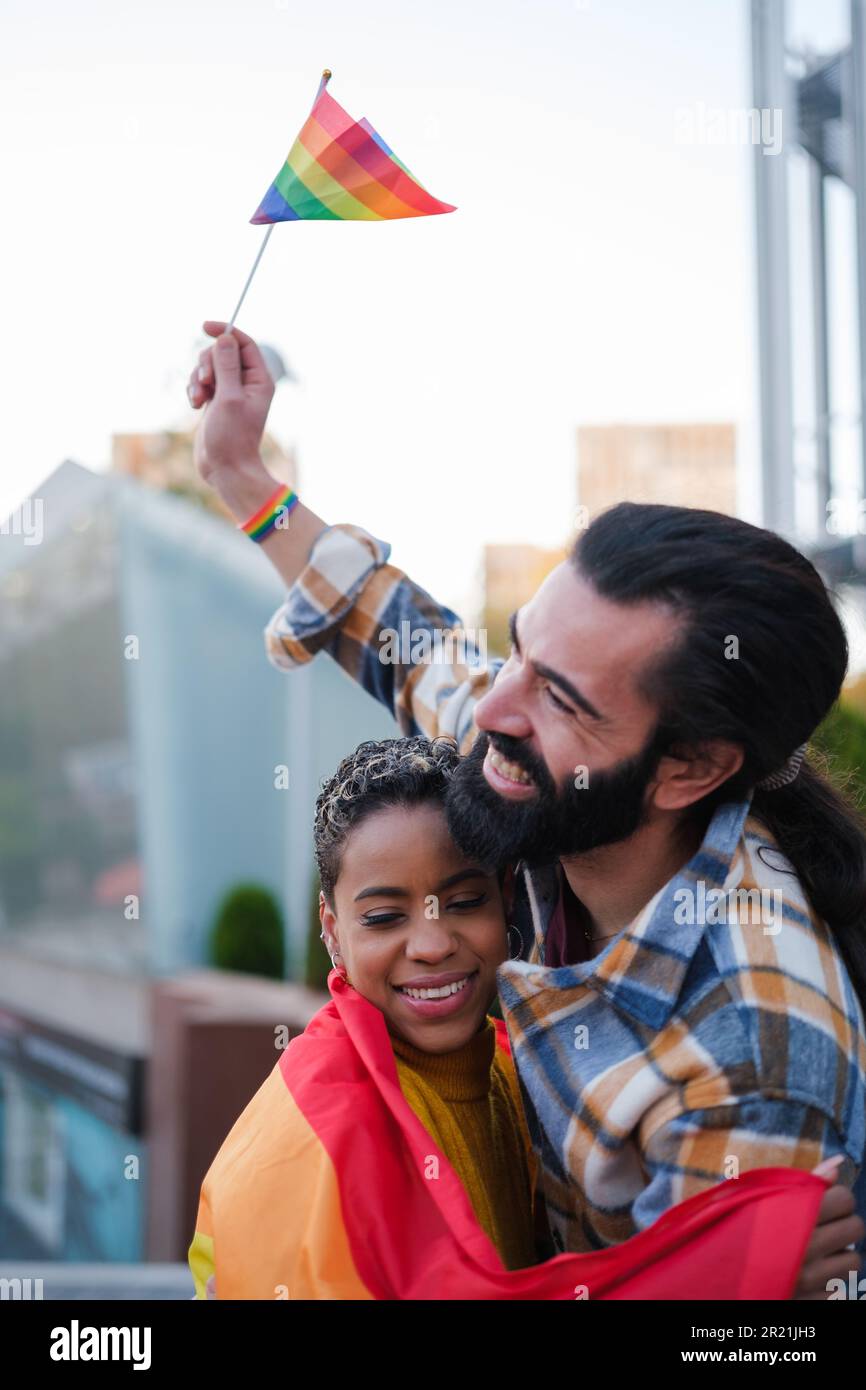 Hug of two young people fighting for lgtbi goals. Concept: Pride ...