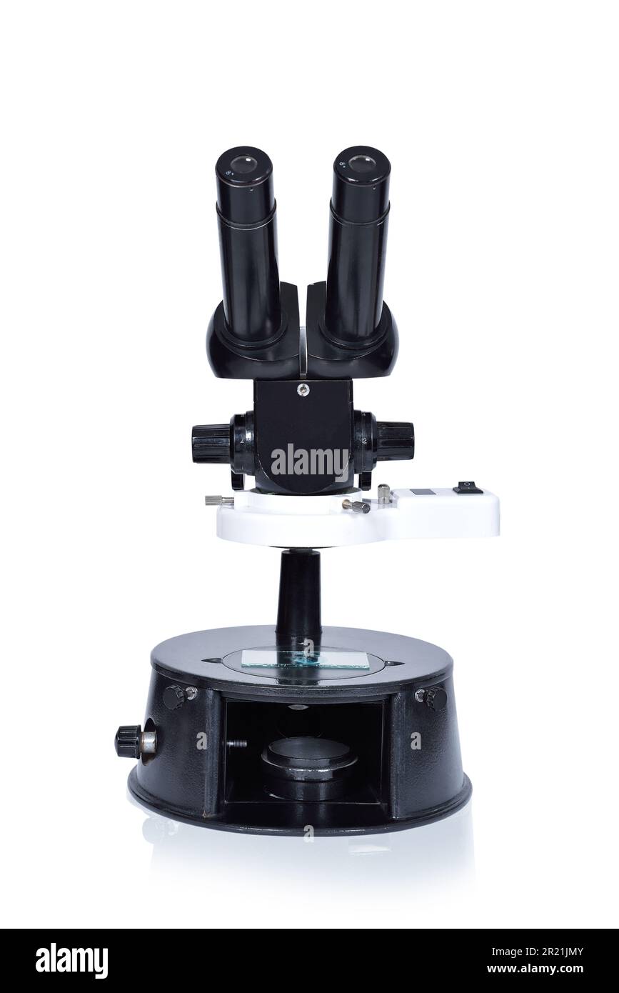 old microscope on a white background Stock Photo - Alamy