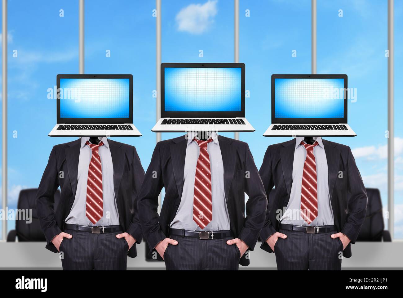 Three businessman with a laptop instead of a head Stock Photo - Alamy