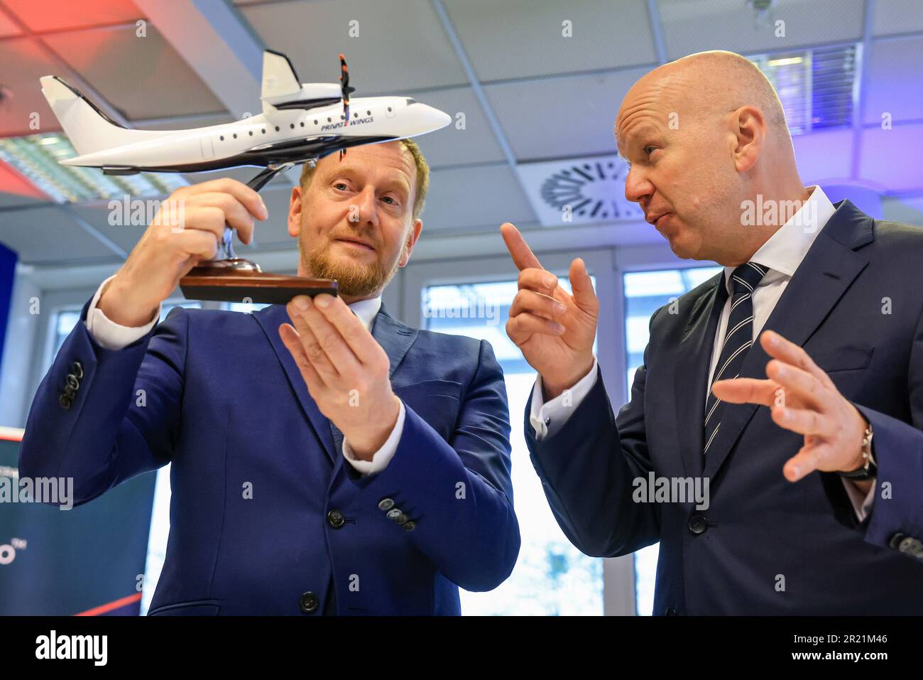 16 May 2023, Saxony, Schkeuditz: Michael Kretschmer (l, CDU), Prime ...