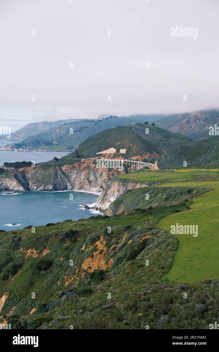 Majestic aerial view of a lush green field overlooking the vast expanse ...
