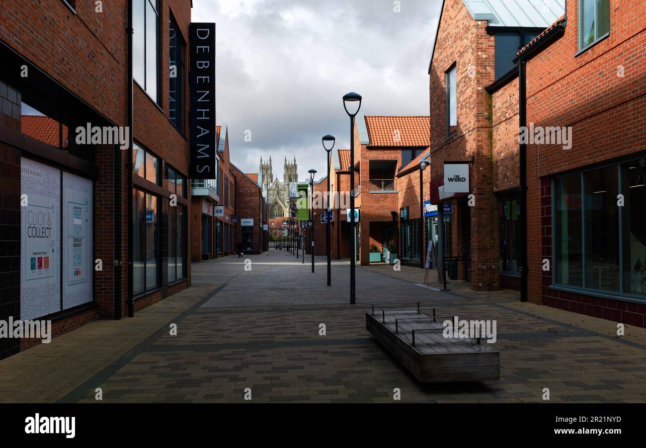 View along Flemingate shopping arcade flanked by closed retail stores ...