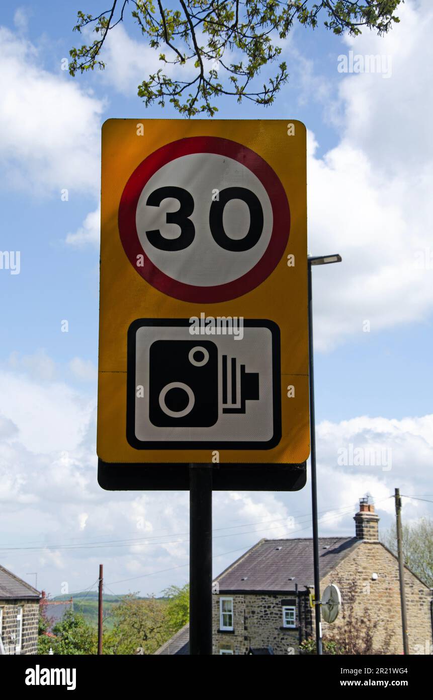 Traffic Road sign for 30mph (miles per hour) speed limit zone a Stock ...