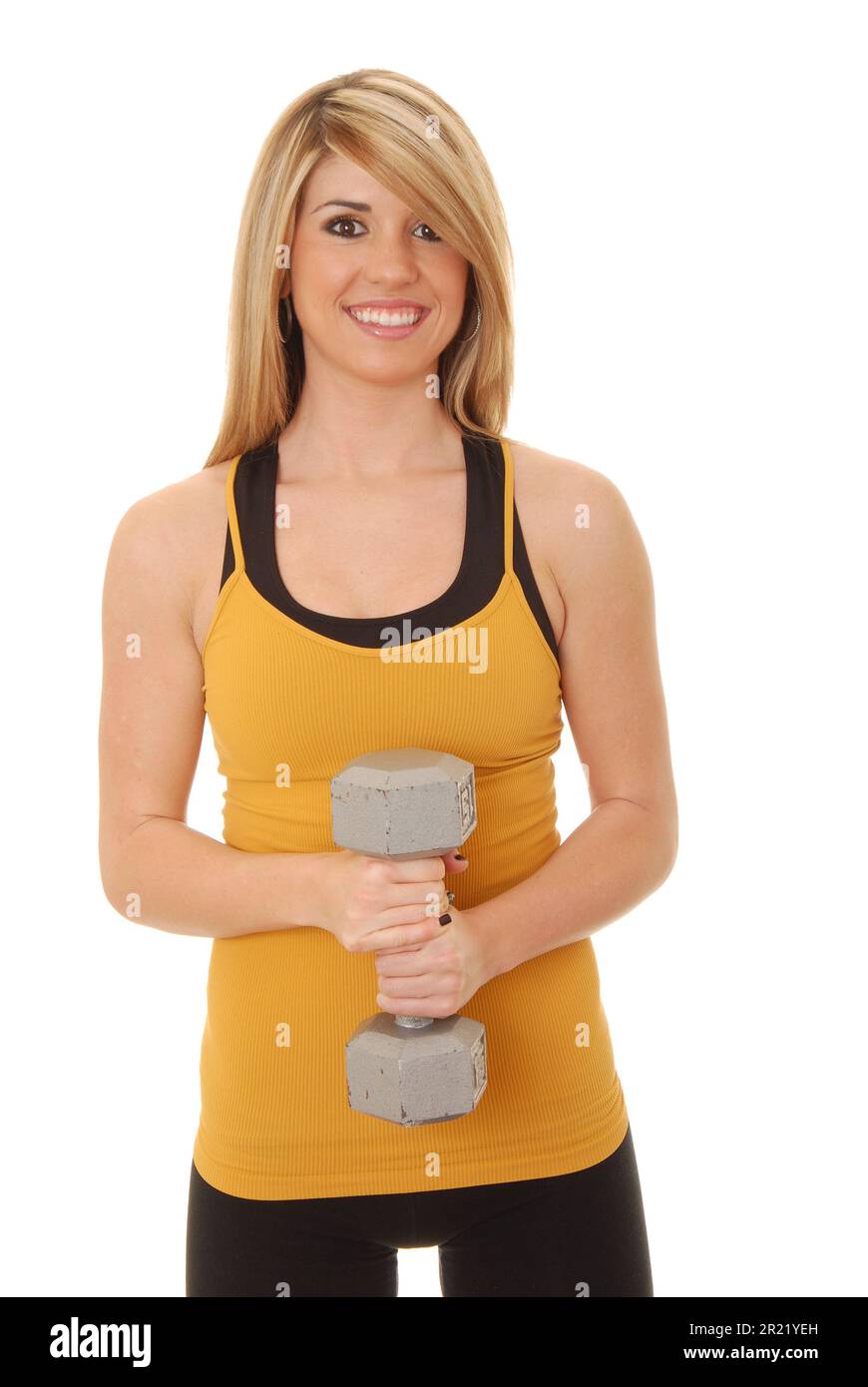 Lovely young blond lady lifting weights isolated Stock Photo - Alamy