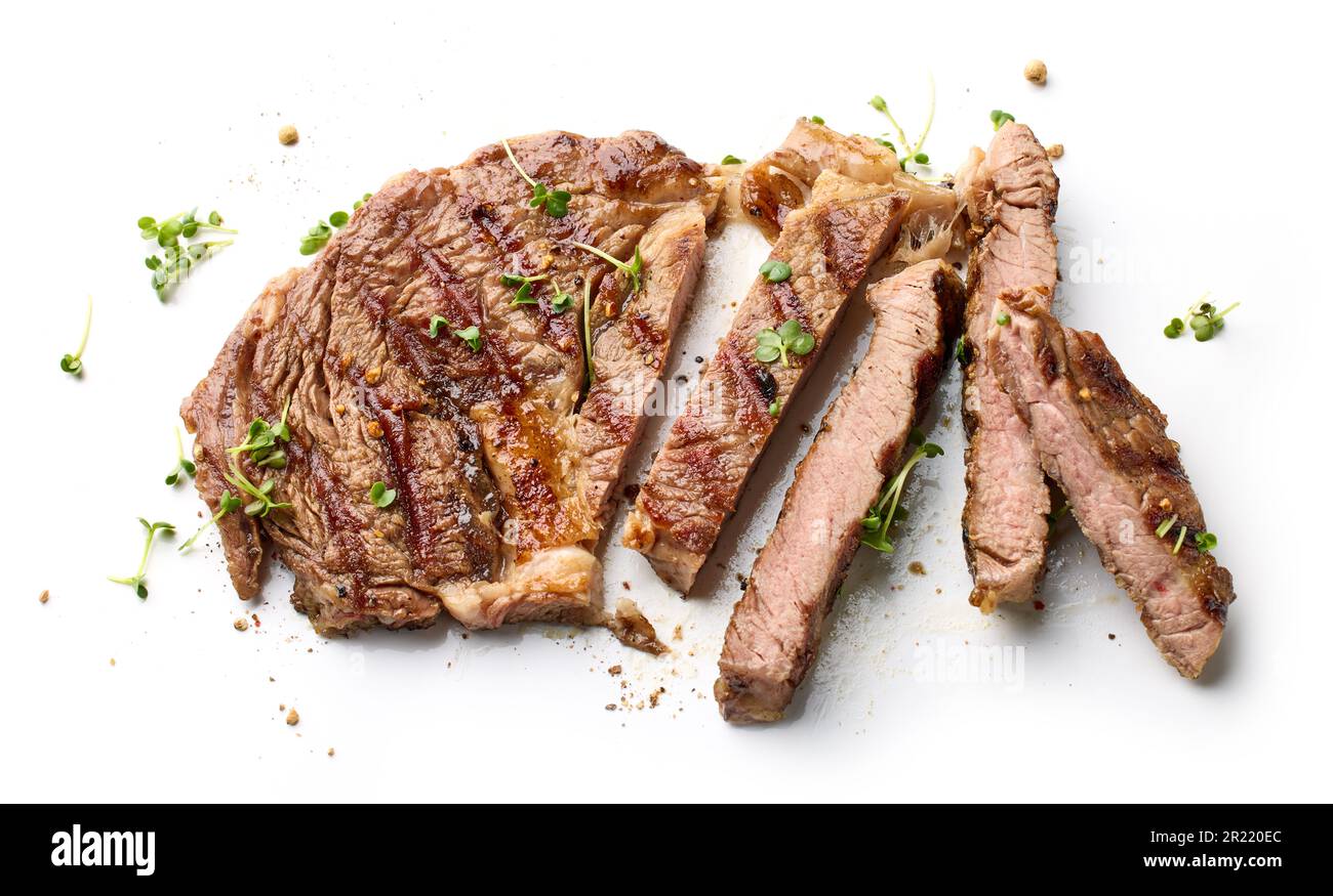 freshly grilled beef entrecote steak isolated on white background, top ...