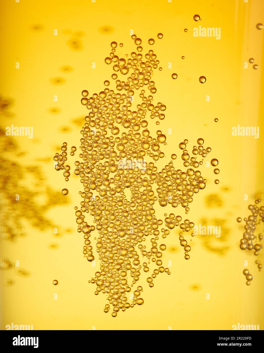 Close up background texture of lager beer with bubbles Stock Photo - Alamy